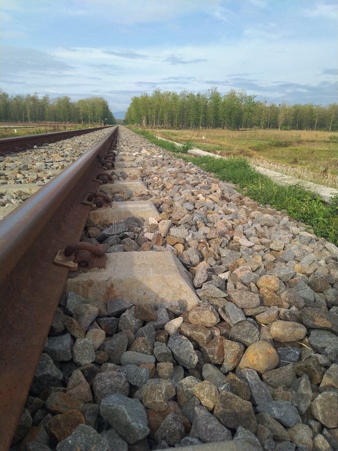 The Rocks are beside the Train Tracks Stock Photo - Image of rocks ...