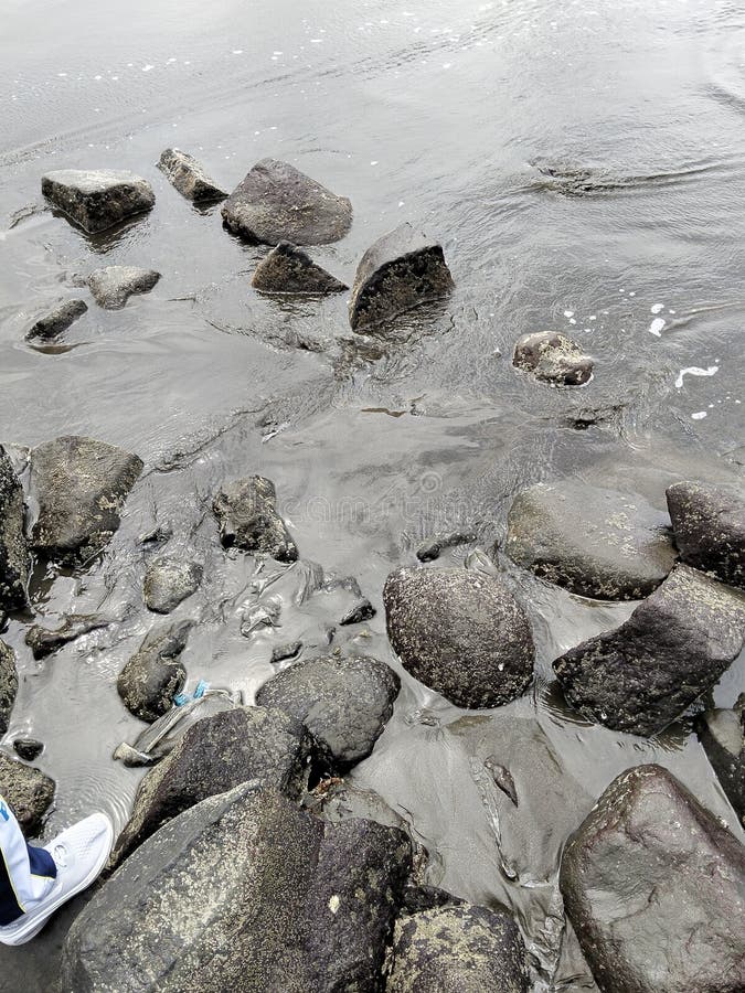 Rocks on Turtle Bay Beach stock image. Image of rocks - 391523285