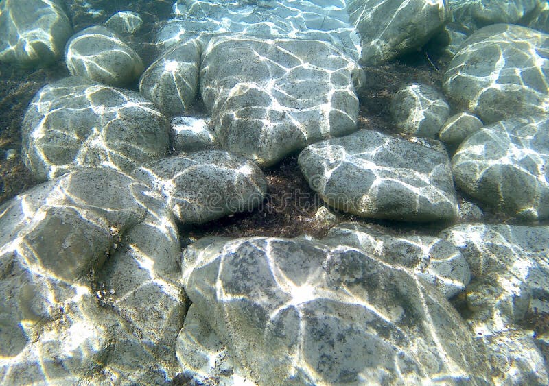 Rocks under the sea stock photo. Image of coral, swimming - 99112188