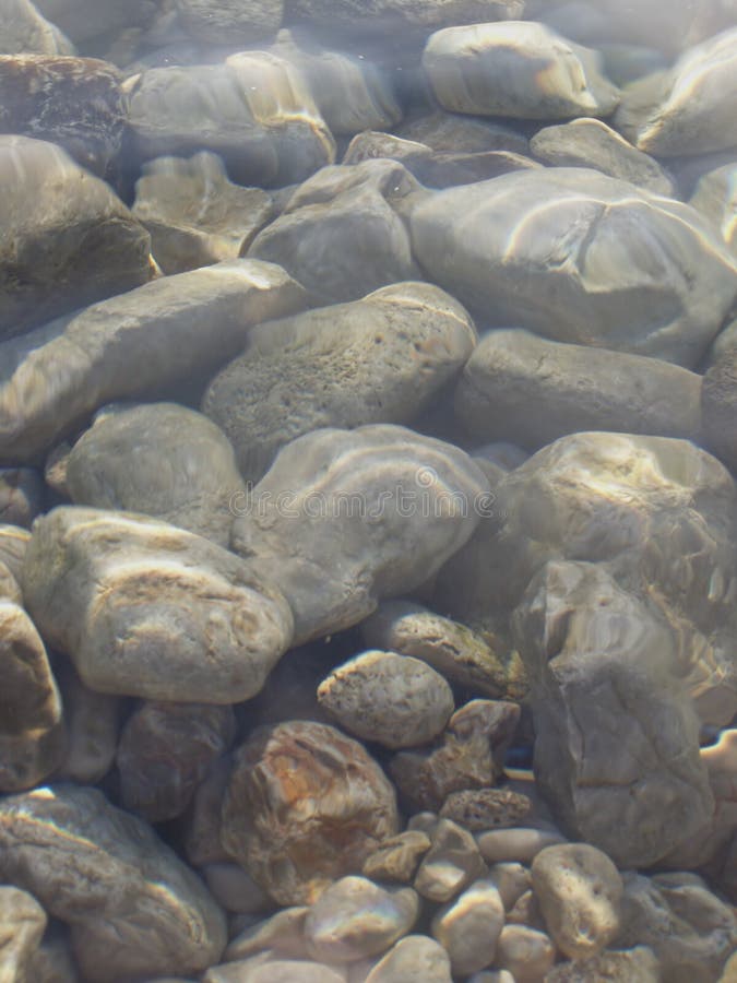 Rocks underwater stock photo. Image of background, pebble - 6429110