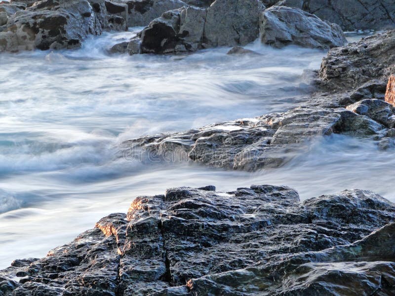 Rocks and Water stock image. Image of cornwall, candy - 14977037