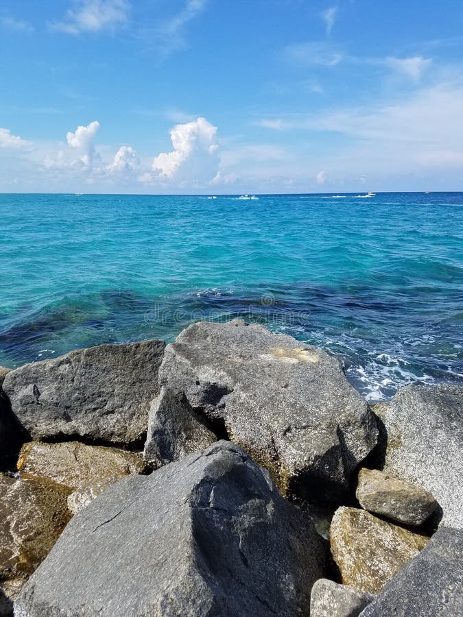 Big rocks in the water stock photo. Image of foam, storm - 255502638