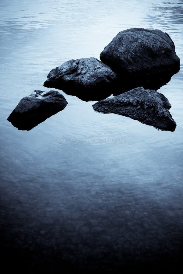 Rocks in the water stock image. Image of nature, reflection - 40194219