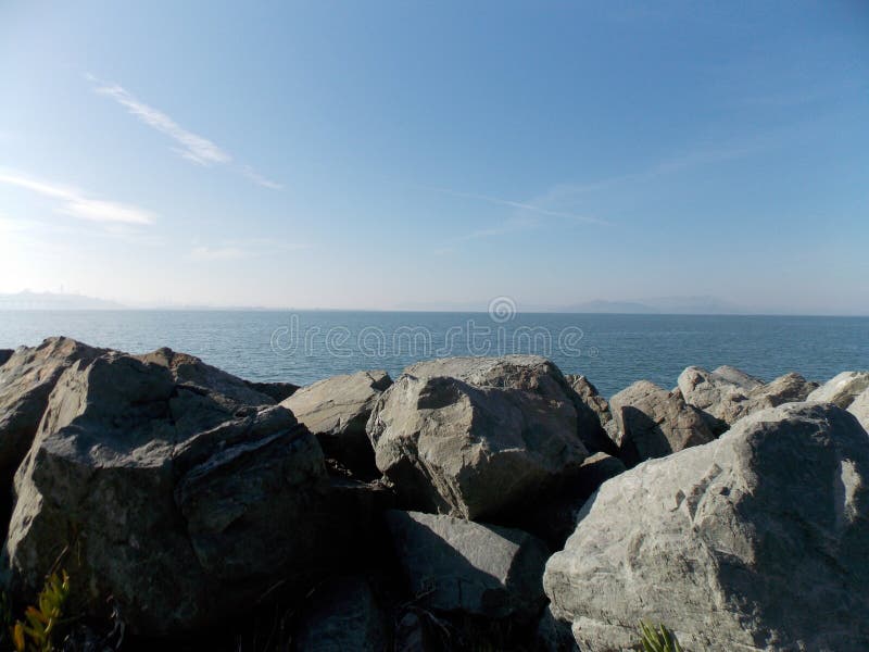 Rocks by the Water stock photo. Image of leaf, oceans - 52320636
