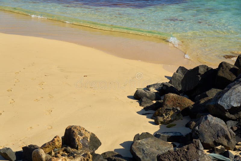 Rocks and Waves on a Sandy Tropical Beach. Stock Image - Image of ...