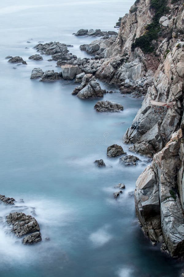 Rocks with winding water stock photo. Image of rocks - 259838018