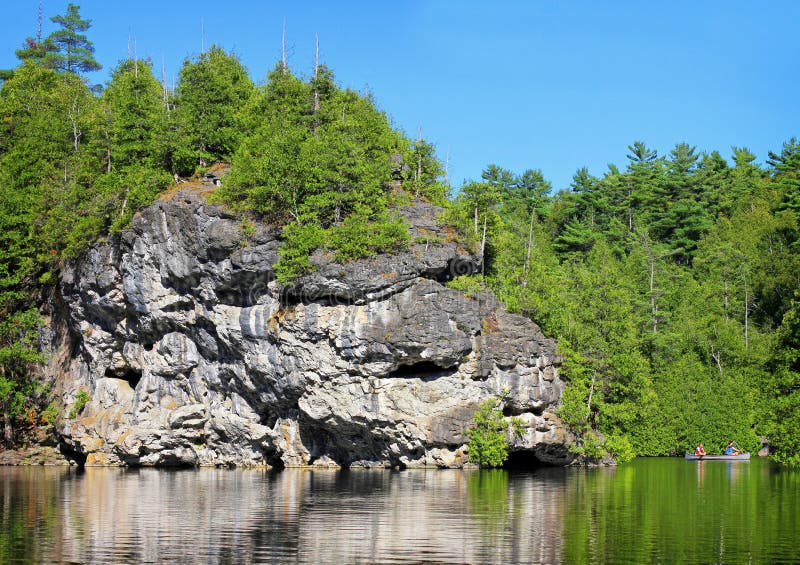 Rock Cliff Lake stock photo. Image of rural, lake, natural - 2959410