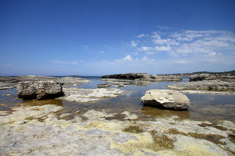 A Rocky Area by the Sea stock image. Image of rocks - 127293313
