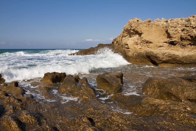 Rocky beach stock photo. Image of coarse, beach, waves - 12107052