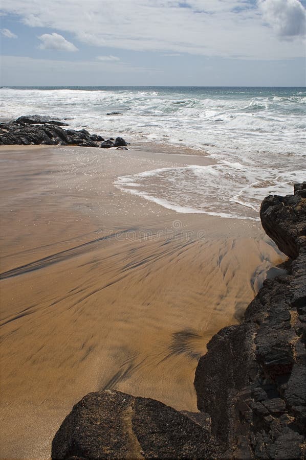 Rocky beach stock image. Image of coastal, waves, sand - 8878621