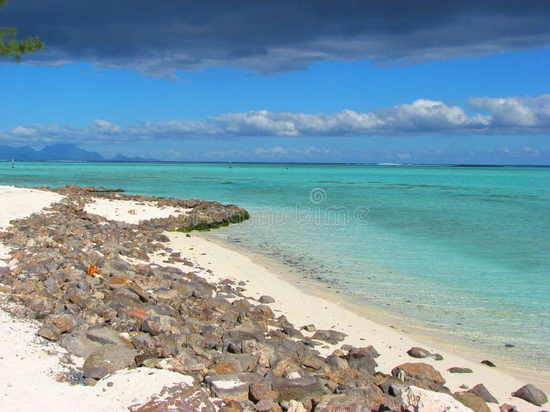 Rocky Beach in Bora-Bora, French Polynesia Stock Photo - Image of ocean ...