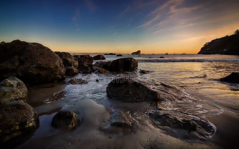 Rocky Beach Landscape at Sunset Stock Image - Image of ocean, scenery ...