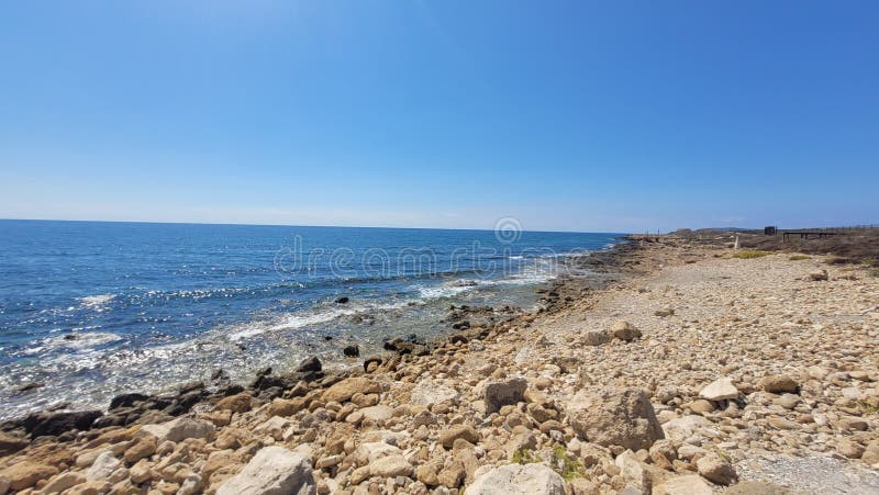 Rocky beach of Paphos stock image. Image of rocky, landscape - 256940987