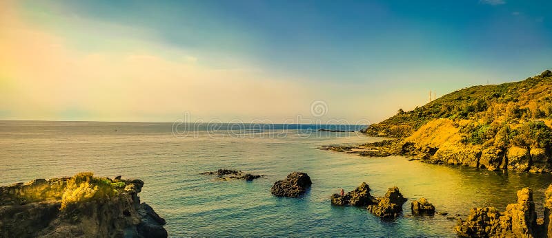 Rocky Beach and the Reflection of the Sun Stock Image - Image of ...