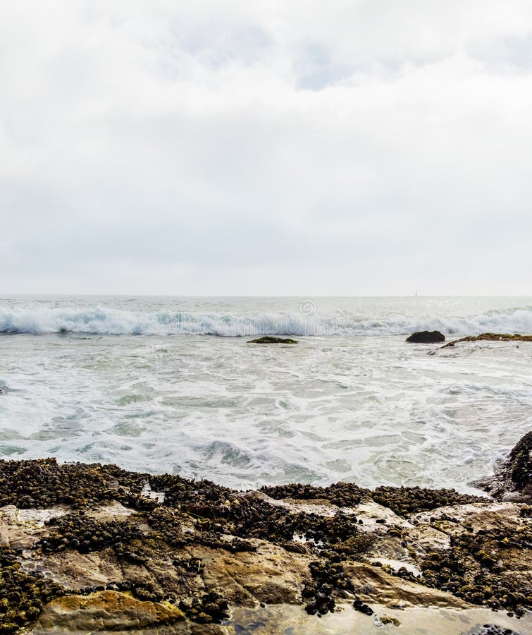Rocky beach stock image. Image of edge, seas, relaxation - 92998777