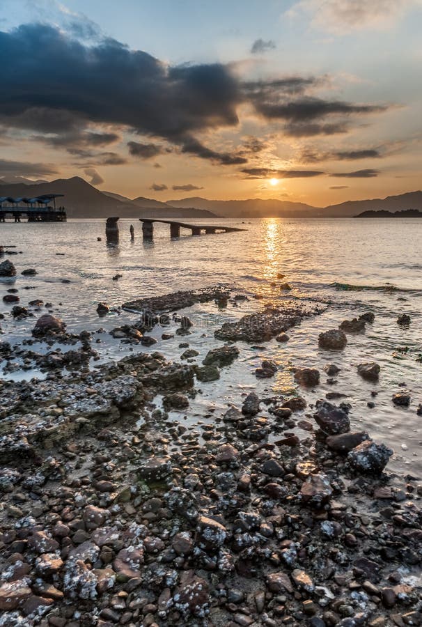 Rocky Beach Sunset stock photo. Image of rocky, ocean - 69231690