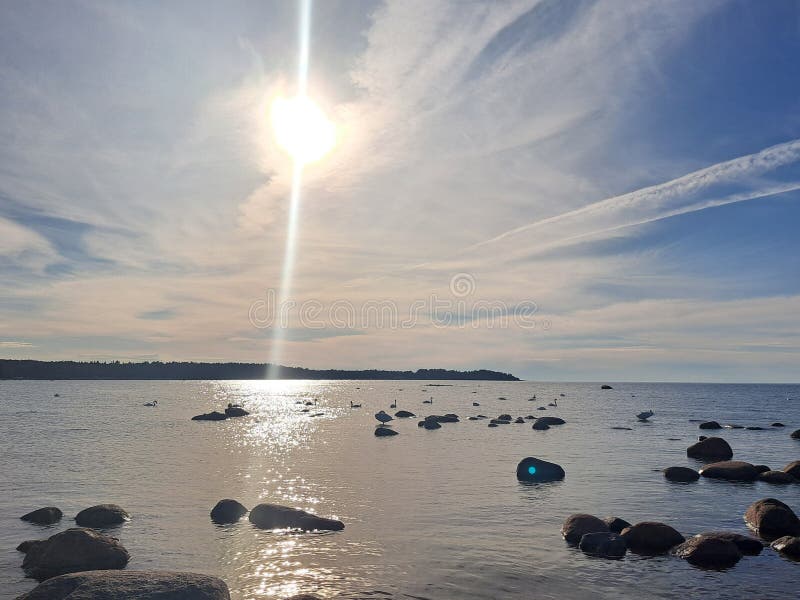 Rocky Beach Under the Evening Sun Light Stock Photo - Image of coast ...