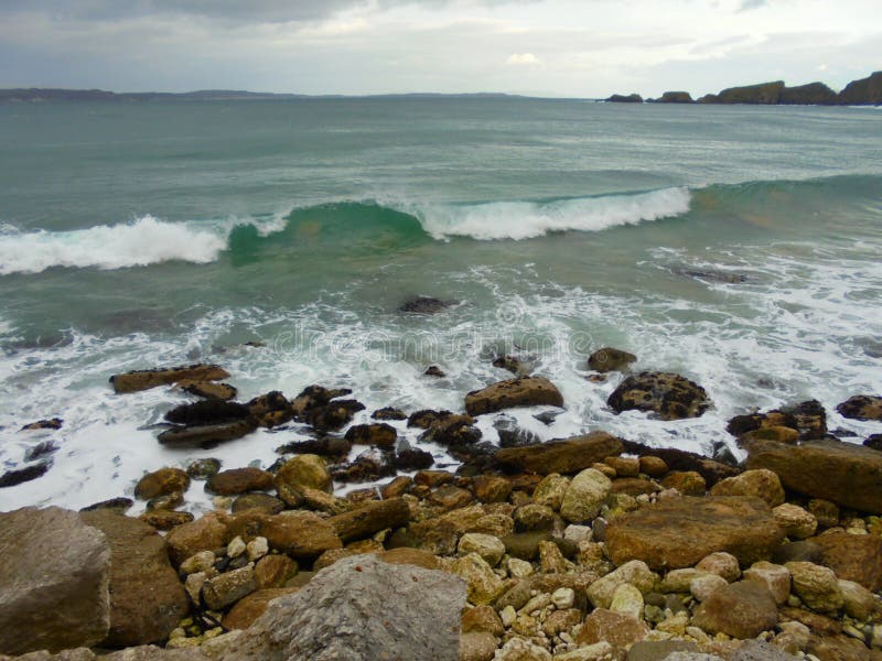 Rocky beach stock image. Image of waves, beach, rocky - 49642989