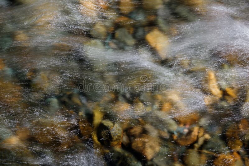 Rocky Bottom of Mountain River through the Clear Water, Selective Focus ...