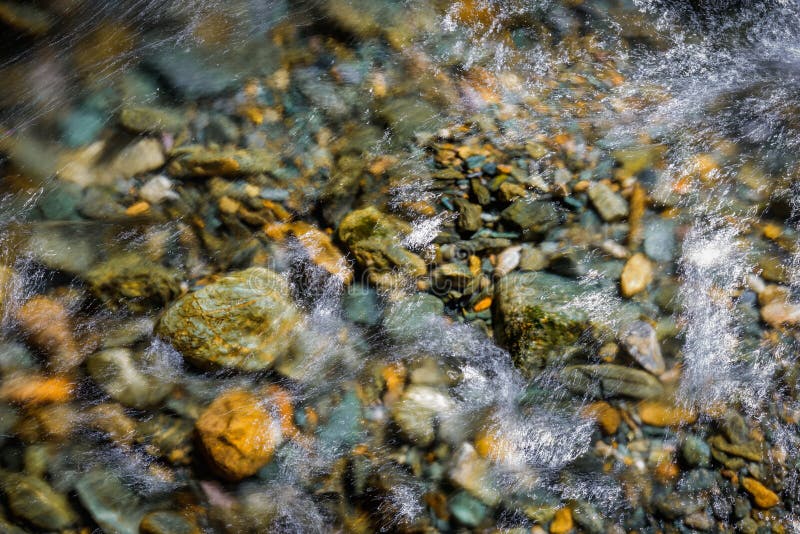 Rocky Bottom of Mountain River through the Clear Water, Selective Focus ...