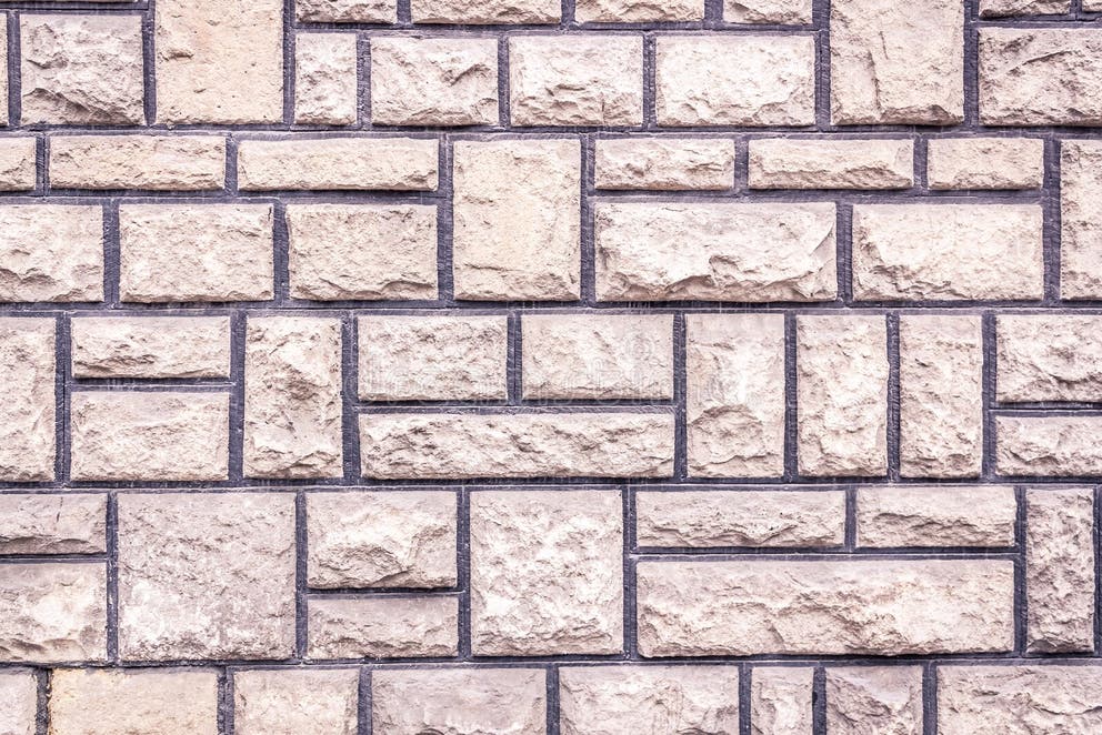 Rocky brick wall stock photo. Image of building, backdrop - 189374870