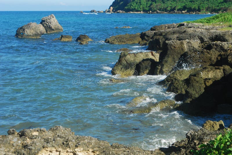 A Rocky yet Calm Seashore stock photo. Image of calm - 150475764