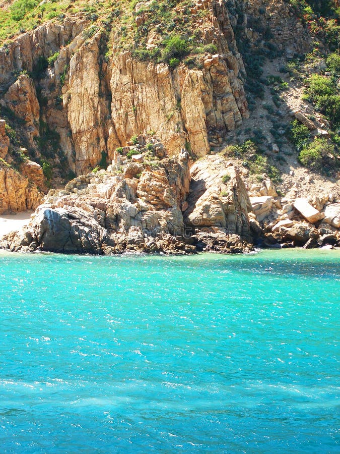 Rocky clear beach stock photo. Image of beach, cliff - 120000526