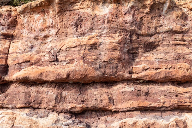 Rocky Cliff Face Showing Striations between the Different Layers of ...