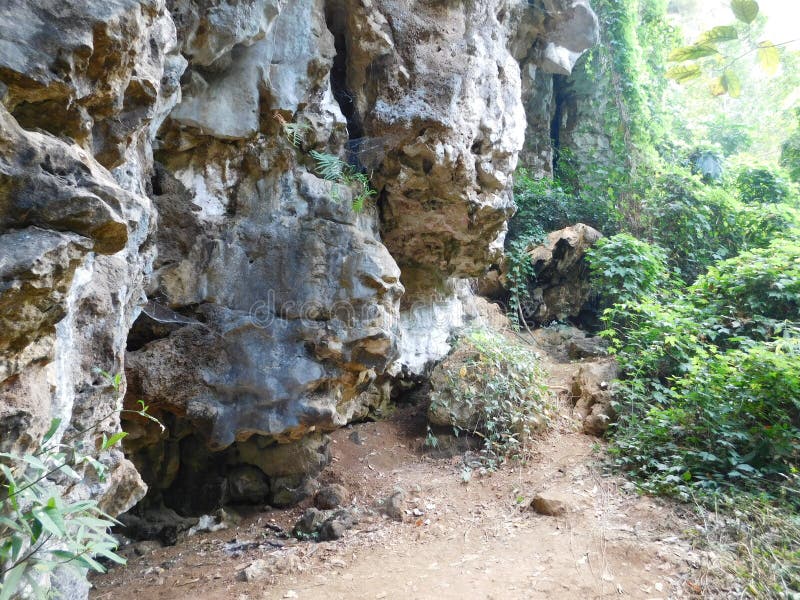 A Rocky Cliff at the Foot of a Mountain Stock Image - Image of hiker ...