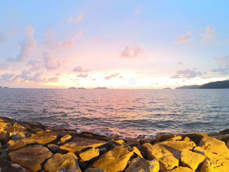 Rocky Cliff Near the Ocean during Sunset Stock Photo - Image of ocean ...