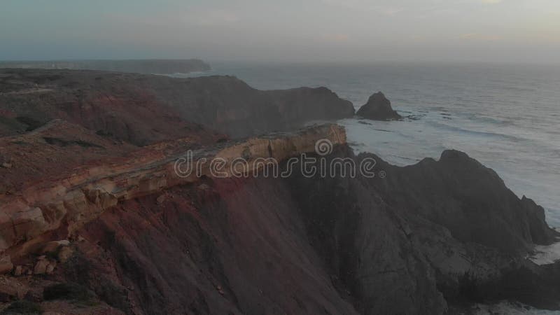 Rocky Cliff Near the Ocean during Sunset Stock Video - Video of summer ...