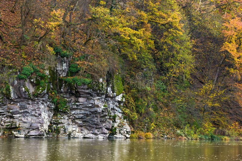 Rocky Cliff Over the River in Forest Stock Image - Image of cliff ...