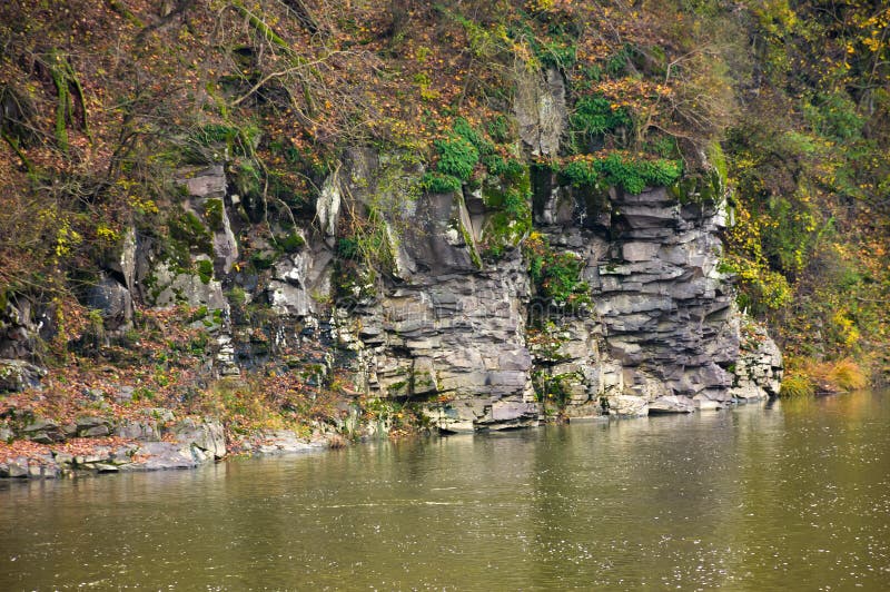 Rocky Cliff Over the River in Forest Stock Photo - Image of lovely ...