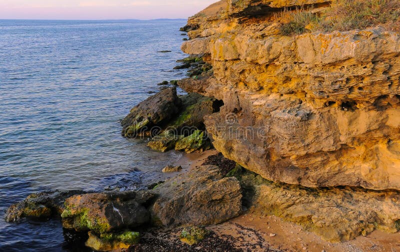 Rocky Cliff Shore, Destroyed by Sea Waves in the Crimea Stock Photo ...