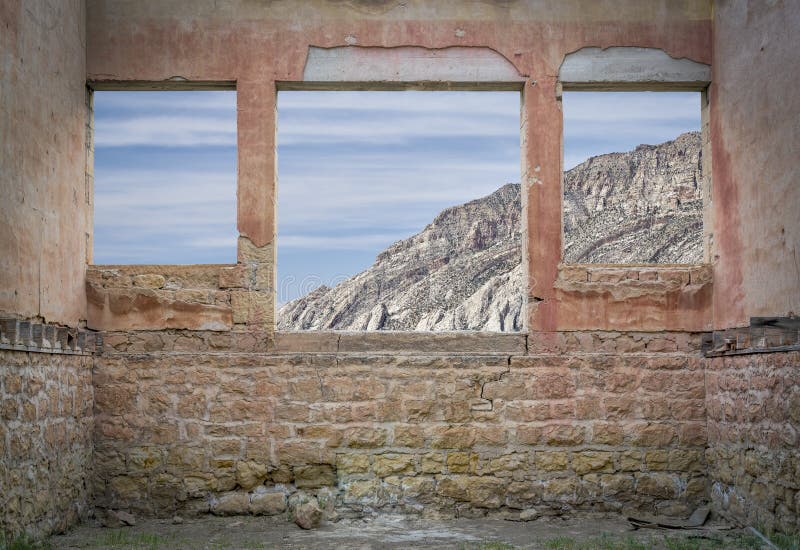Rocky Cliff View through Windows Stock Image - Image of brick, desert ...
