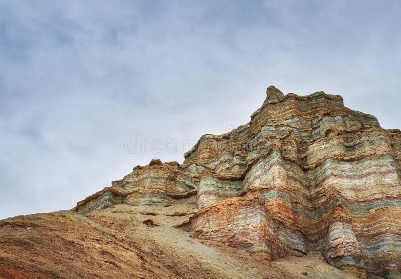 Rocky Cliffs of Multi-colored Rocks, a Canyon among the Ancient Desert ...