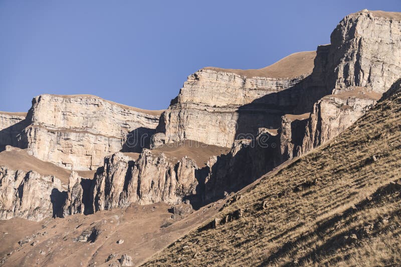 Rocky Cliffs and Steep Mountain Cliffs in the Mountains on an Autumn ...