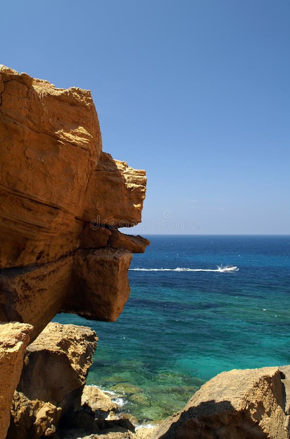 The Rocky coast. stock photo. Image of sunny, shore, coastline - 1634042
