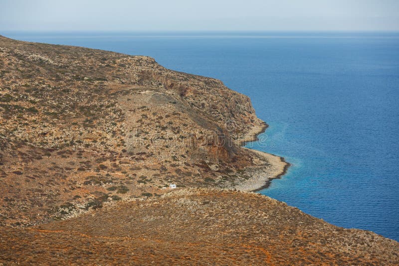 Rocky coast of Crete stock photo. Image of rock, calm - 79577060