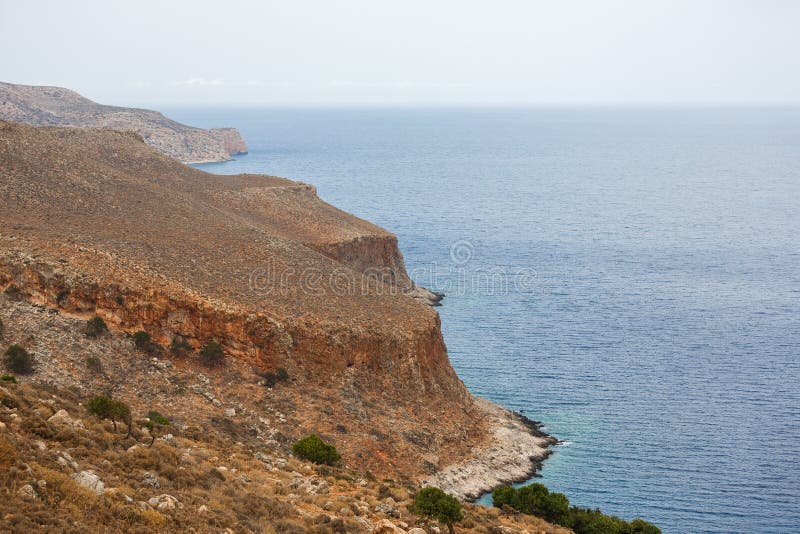 Rocky coast of Crete stock image. Image of shore, azure - 79600853