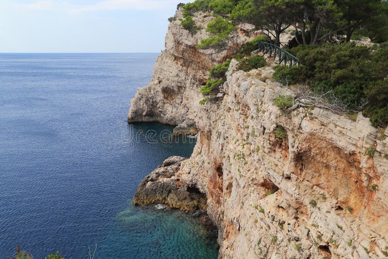 Rocky coast of Croatia stock photo. Image of island, cliff - 99273612