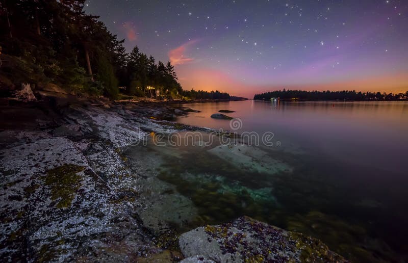 Rocky Coast at Night with Purple Sky Stock Image - Image of columbia ...