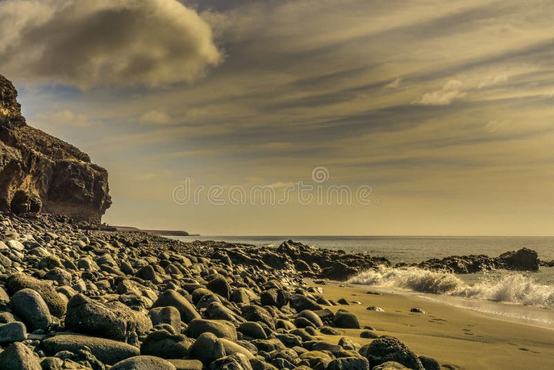 Rocky Coast at Sunset with Dark Clouds Stock Image - Image of atlantic ...