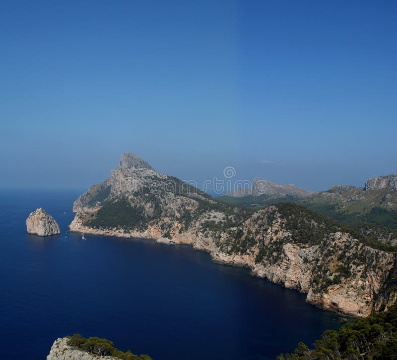 Rocky Coastline and Blue Sea Stock Photo - Image of ocean, shoreline ...