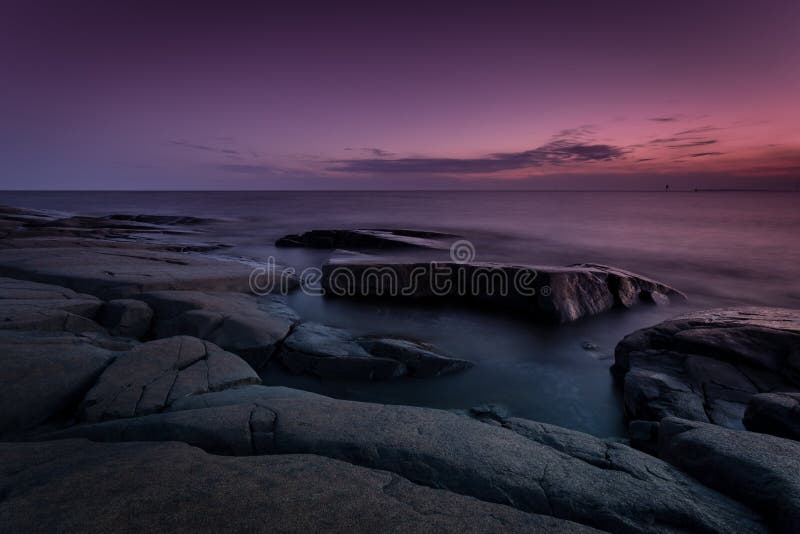 Rocky coastline night stock photo. Image of seacoast - 24915066
