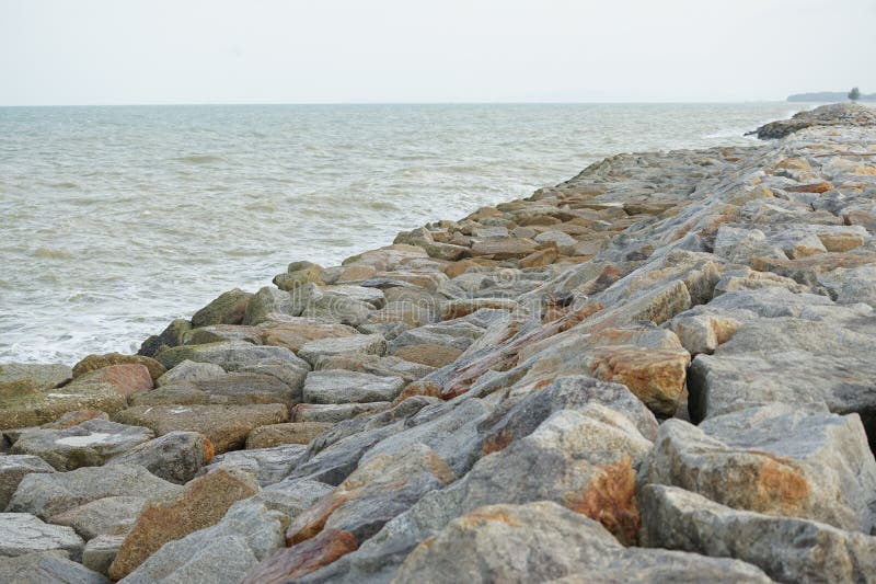 The Rocky Dam at the Shore for Protecting from the Strong Wave ...