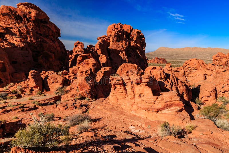 A Rocky Desert Landscape with a Blue Sky in the Background Stock Image ...