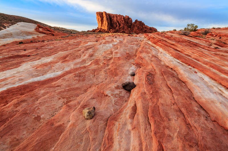 A Rocky Desert Landscape with a Large Rock in the Foreground Stock ...