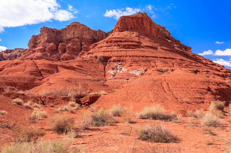 A Rocky Hillside with a Blue Sky in the Background Stock Image - Image ...
