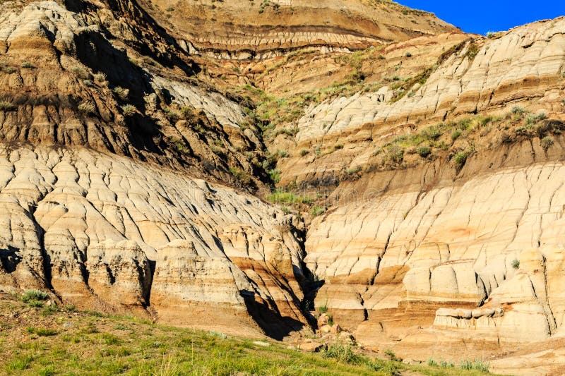 A Rocky Hillside with a Small Valley in the Middle Stock Photo - Image ...